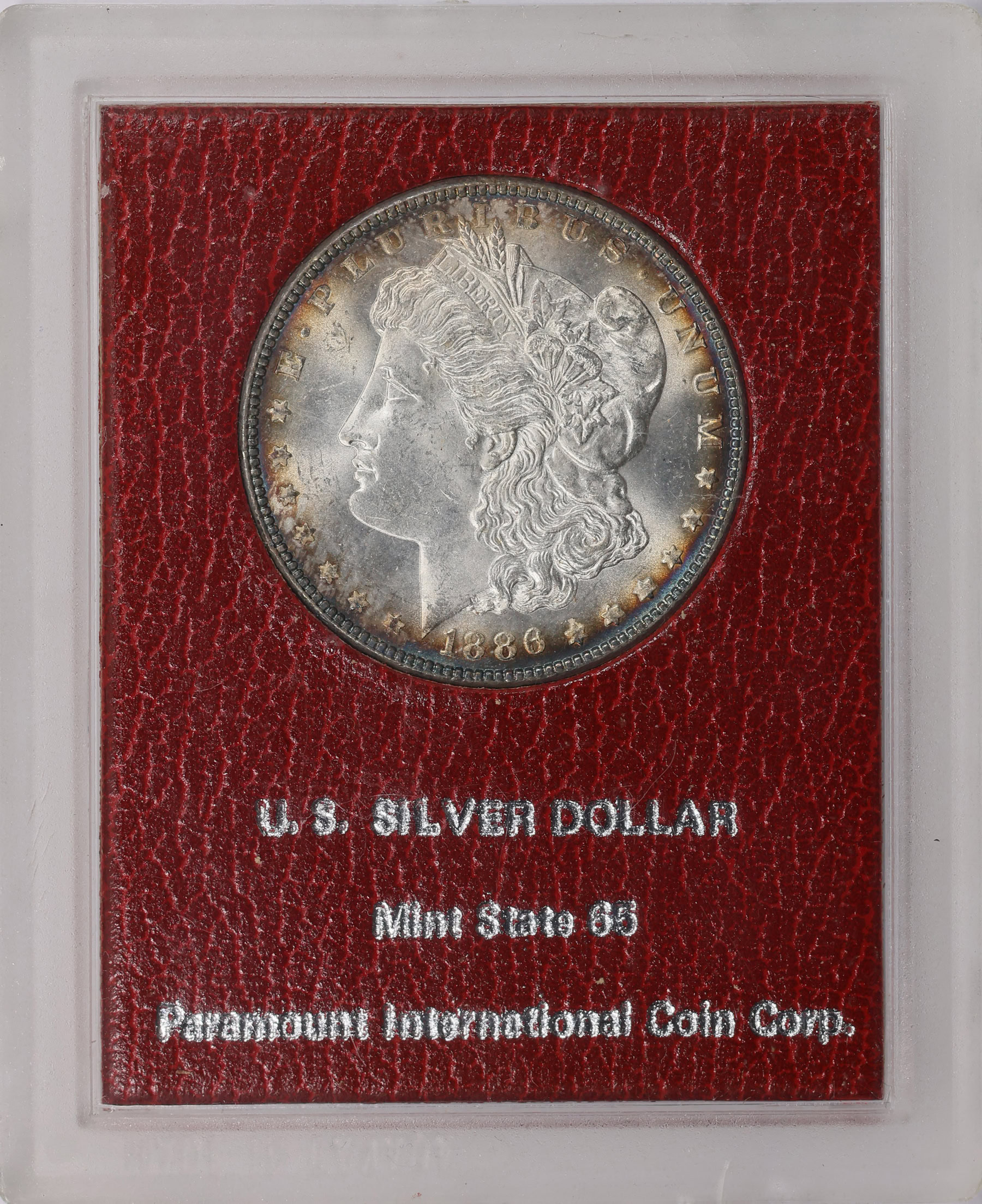 1886 Morgan Silver Dollar MS-65 (Paramount Red Holder) (Toned) | Cert # ...
