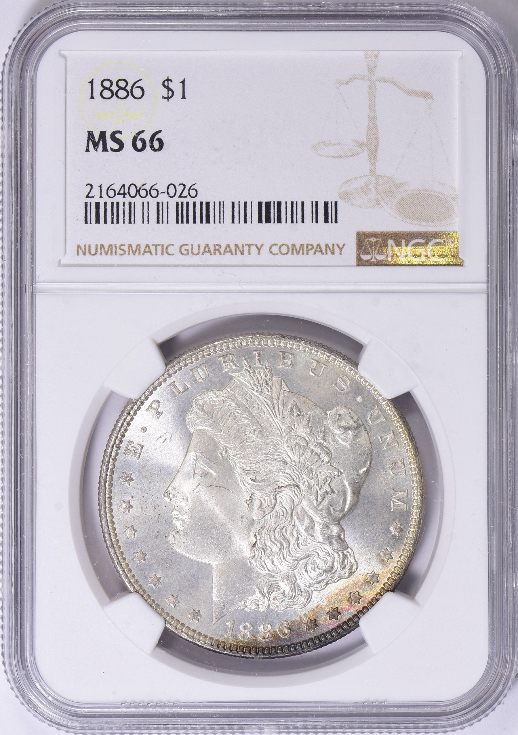 1886 Morgan Silver Dollar NGC MS-66 (Toned) (Item 1744361) | GreatCollections Coin Auctions