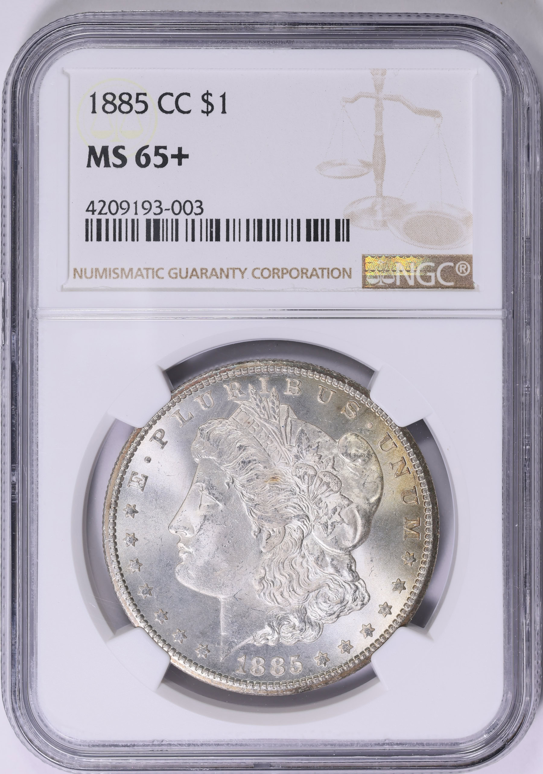 1885-CC Morgan Silver Dollar NGC MS-65+ (Toned) (Item 1798292) | GreatCollections Coin Auctions