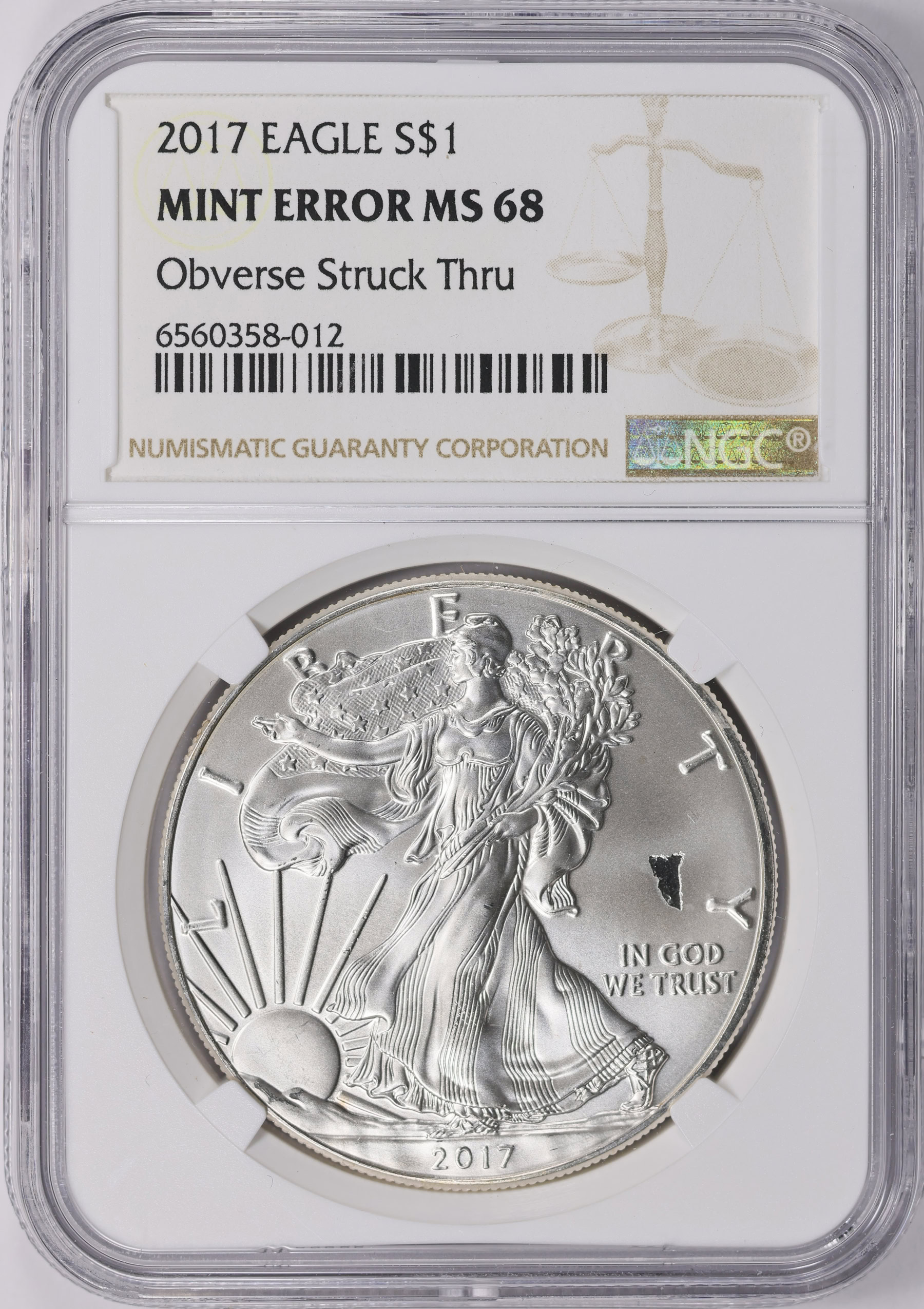 Mint Error 2017 $1 Silver Eagle Obverse Struck Thru NGC MS-68 | NGC Cert #6560358-012 ...